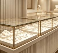 China Customizable High-End Luxury Modern Round Glass LED-Lit Display Showcase for Jewelry and Watches Retail Display Case for sale