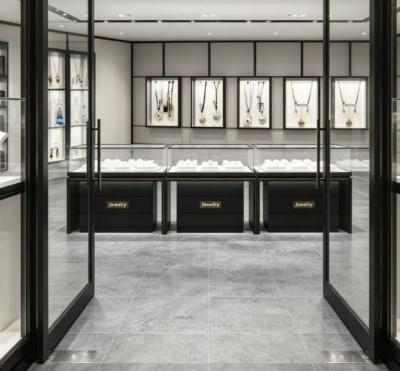 China OEM Floor Standing Jewelry Display Showcase, Black Metal Glass Cabinet for Jewelry Store Interior for sale
