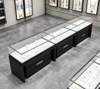 China OEM Floor Standing Jewelry Display Showcase, Black Metal Glass Cabinet for Jewelry Store Interior for sale