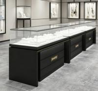 China OEM Floor Standing Jewelry Display Showcase, Black Metal Glass Cabinet for Jewelry Store Interior for sale