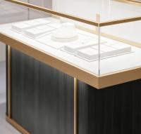 China Commercial Interior Design for Luxury Jewelry Showroom Display Cabinets with LED Lighting Vintage Gold Finish for Shopping Malls for sale