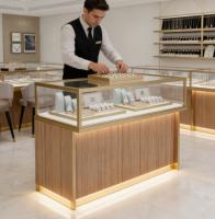 China Luxury Modern LED Jewelry Display Case Custom Wood Grain Glass Island Showcase for Diamond Ring Necklace Showroom Retail Store for sale
