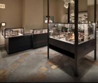 China Customizable LED Lighting Jewelry Display Counters with Dark Gray Base & Natural Stone Floor for Luxury Store Showroom Furniture for sale