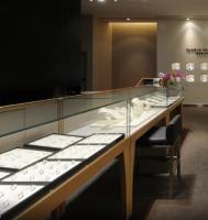 China Premium Iron Jewelry Display Counter Straight Corner Island LED Lighting Historical Theme Boutique Showcase Retail Store Mall for sale