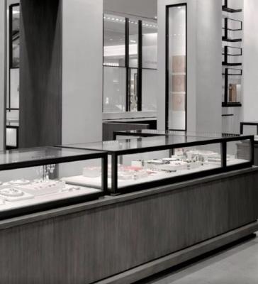 China High-End Custom Glass Jewelry Showcases with LED Lighting and Modern Black Metal Frame for Retail Stores for sale