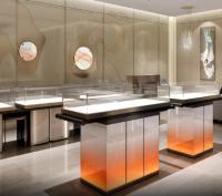 China New Chinese Zen Style Warm Gold Gradient LED Durable Jewelry Display Cases High End Custom Glass Showcases Metal Frame Retail for sale