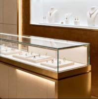 China Italian Luxury Jewelry Display Set High-End Custom Showcase with Glass Panel Gold Metal Trim LED Lighting for Luxury Retail for sale