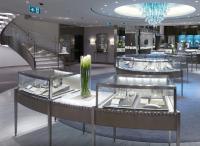 China Modular Iron Jewelry Display Counter Curved Island Tall Podium LED Lighting Durable High Quality Customizable Boutique Malls for sale