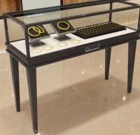China Minimalist Luxury Jewelry Display Table Set High End Custom Showcase Glass Top Metal Frame LED Luxury Retail Premium Modern for sale