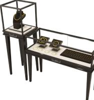 China Minimalist Luxury Jewelry Display Table Set High End Custom Showcase Glass Top Metal Frame LED Luxury Retail Premium Modern for sale