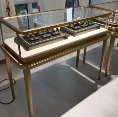 China Luxury Square Jewelry Display Case High End Custom Showcase with Glass Panel & Bronze Metal Trim LED Lighting for Luxury Retail for sale