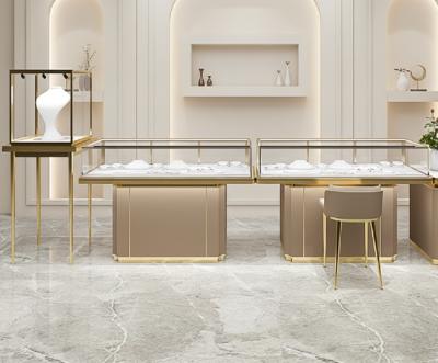 China Premium LED Commercial Jewelry Display Cabinet Freestanding & Countertop Design Luxury Champagne Gold Finish Showcase for sale