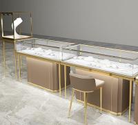 China Premium LED Commercial Jewelry Display Cabinet Freestanding & Countertop Design Luxury Champagne Gold Finish Showcase for sale