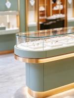 China 25kg Jewelry Display Table with High-clarity Tempered Glass, Lockable Compartments, and Rust-proof Gold Metal Frame for sale