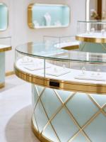 China 25kg Jewelry Display Table with High-clarity Tempered Glass, Lockable Compartments, and Rust-proof Gold Metal Frame for sale