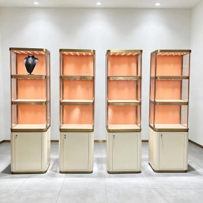 China Customized Jewelry Shop Design with Interactive Digital Displays Polished Marble Flooring and White And Gold Color Scheme for sale