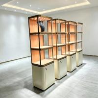 China Customized Jewelry Shop Design with Interactive Digital Displays Polished Marble Flooring and White And Gold Color Scheme for sale