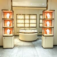 China Customized Jewelry Shop Design with Interactive Digital Displays Polished Marble Flooring and White And Gold Color Scheme for sale