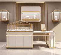 China Customized Shelf Dimensions Luxury Front Showcase with Tempered Glass and LED Interior Lighting for Commercial Spaces for sale