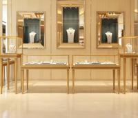 China Customized Item Shape Jewelry Display Table with Rust-proof Gold Metal Frame and High-Security Locks for sale