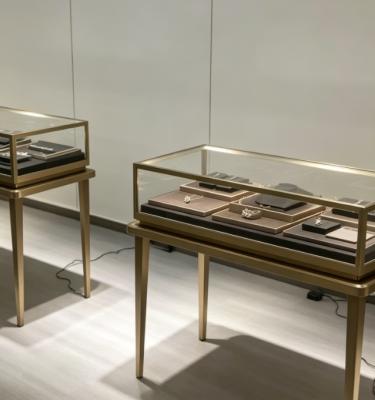 China Freestanding Island Display Cabinet with Tempered Glass Top, Lockable Glass Doors, and Customizable Modular Layout for sale