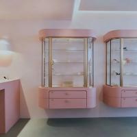 China Tempered Glass And Solid Wood Luxury Front Showcase With LED Interior Lighting And Adjustable Glass Shelves for sale