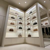 China Luxury Front Showcase with 5 Adjustable Glass Shelves Tempered Glass and LED Interior Lighting for Clothing Display for sale