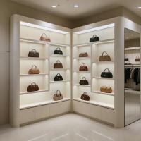 China Luxury Front Showcase with 5 Adjustable Glass Shelves Tempered Glass and LED Interior Lighting for Clothing Display for sale