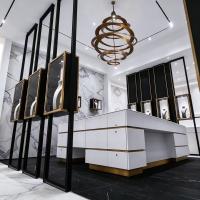 China Upright Display Case with Built-in LED Strip Lights, 50kg Per Shelf Weight Capacity, and Natural Marble Vein Finish for sale