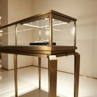 China Customized Wall Mounted Display Case with 50kg Shelf Weight Capacity, Front Opening Soft-Close Doors, and Top-mounted LED Spotlights for sale