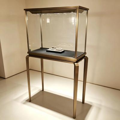 China Customized Wall Mounted Display Case with 50kg Shelf Weight Capacity, Front Opening Soft-Close Doors, and Top-mounted LED Spotlights for sale