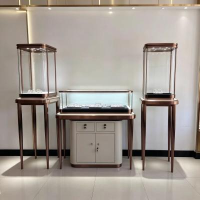China Luxury Front Showcase with 50kg Shelf Weight Capacity Glossy Black With Chrome Accents and Built-in Air Vents for Retail Display for sale