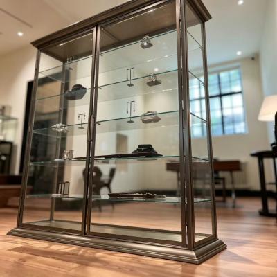 China Customized Dimensions Luxury Front Showcase with LED Interior Lighting and 50kg Per Shelf Capacity for sale