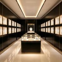 China Natural Marble Base Upright Display Case with Integrated LED Lighting and Adjustable Glass Shelves for sale