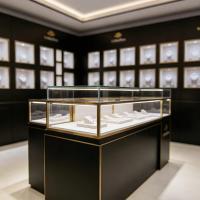 China Natural Marble Base Upright Display Case with Integrated LED Lighting and Adjustable Glass Shelves for sale
