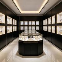 China Natural Marble Base Upright Display Case with Integrated LED Lighting and Adjustable Glass Shelves for sale