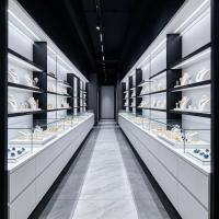 China Luxury Front Showcase with Tempered Glass and Solid Wood Construction 200cm x 80cm x 220cm Front Opening Soft-Close Mechanism for sale