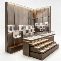 China 25kg Jewelry Display Table with Rust-proof Gold Metal Frame, Tempered Glass Shelving, and Velvet Lined Drawer for Secure Jewelry Showcase for sale