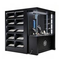 China Rust-proof Gold Metal Frame Jewelry Display Table with Lockable Compartments and Tempered Glass Shelving for sale
