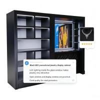 China Rust-proof Gold Metal Frame Jewelry Display Table with Lockable Compartments and Tempered Glass Shelving for sale