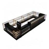 China Matte Black Stainless Steel Wall Mounted Display Case with Built-in High CRI LED Lighting and Adjustable Glass Shelves for sale