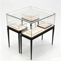China Matte Black Stainless Steel Wall Mounted Display Case with Energy LED Lighting and Solid Back Construction for sale