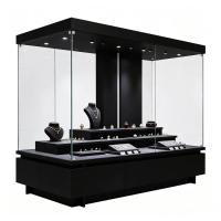 China Matte Black Stainless Steel Wall Mounted Display Case with Adjustable Glass Shelves and Dustproof Secure Protection for sale