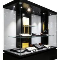 China Matte Black Stainless Steel Wall Mounted Display Case with Adjustable Glass Shelves and Dustproof Secure Protection for sale