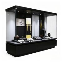 China Matte Black Stainless Steel Wall Mounted Display Case with Adjustable Glass Shelves and Dustproof Secure Protection for sale