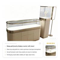 China Shatter-resistant Tempered Glass Jewelry Shop Design with White And Gold Color Scheme and Custom Logo Signage for sale