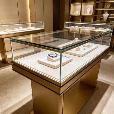China Freestanding Island Display Cabinet with Dimmable LED Lighting System, Lockable Glass Doors, and Curved Central Showcase for sale
