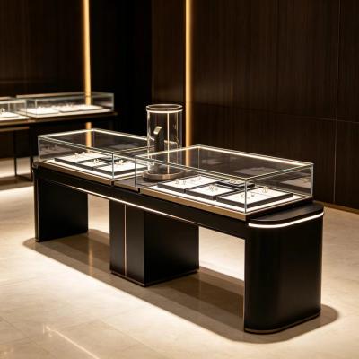 China Freestanding Island Display Cabinet with Curved Glass Dimmable Brightness and Lockable Glass Doors for sale