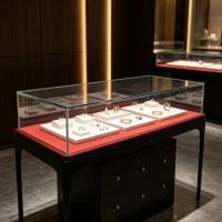 China Upright Display Case with Ventilated Back Panel and Sliding Glass Doors Offering 50kg Per Shelf Weight Capacity for sale