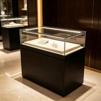 China Wall Mounted Display Case with 50kg Per Shelf Weight Capacity, Adjustable Glass Shelves, and Top LED Spotlights And Strip Lighting for sale